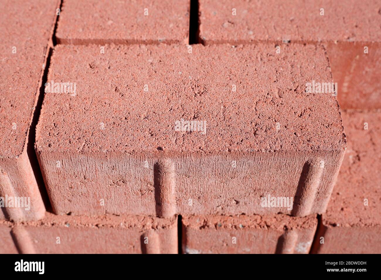 Red cobblestones made of concrete, piled up, Germany, Europe Stock ...