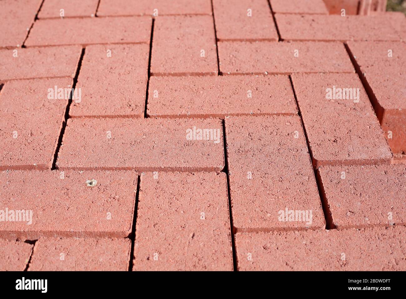 Red cobblestones made of concrete, Germany, Europe Stock Photo - Alamy