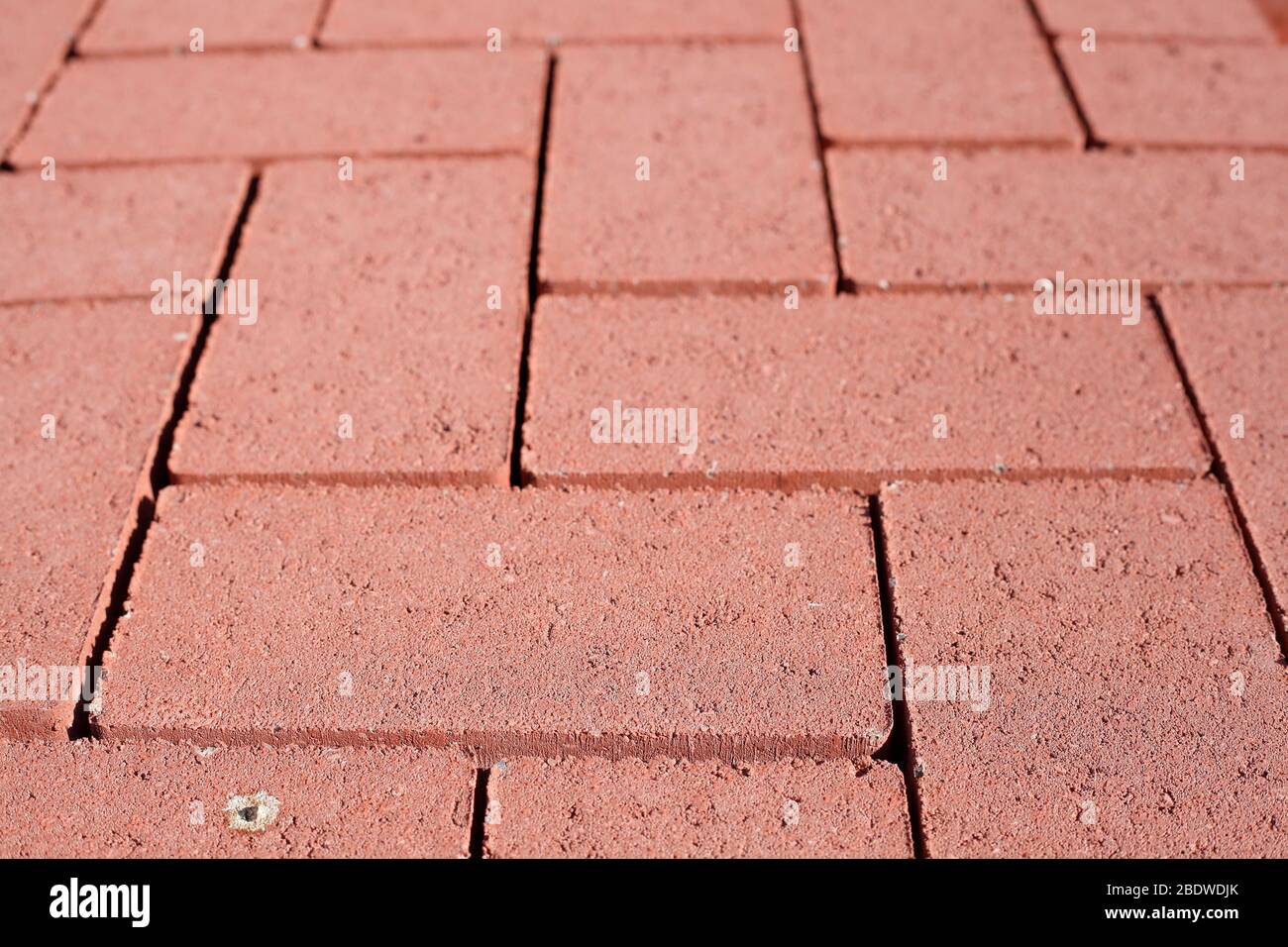 Red cobblestones made of concrete, Germany, Europe Stock Photo - Alamy