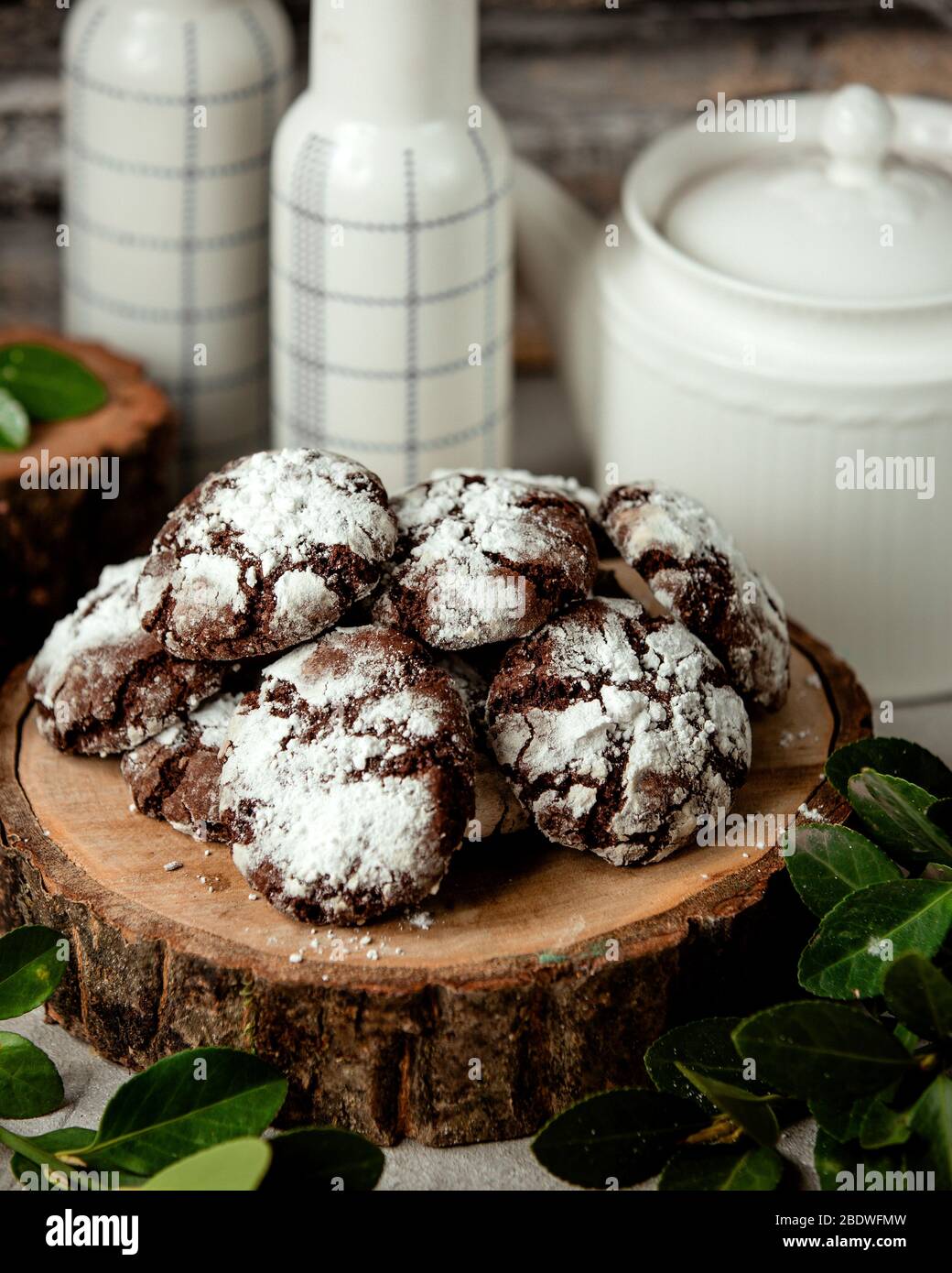 chocolade cookies with white powder Stock Photo - Alamy