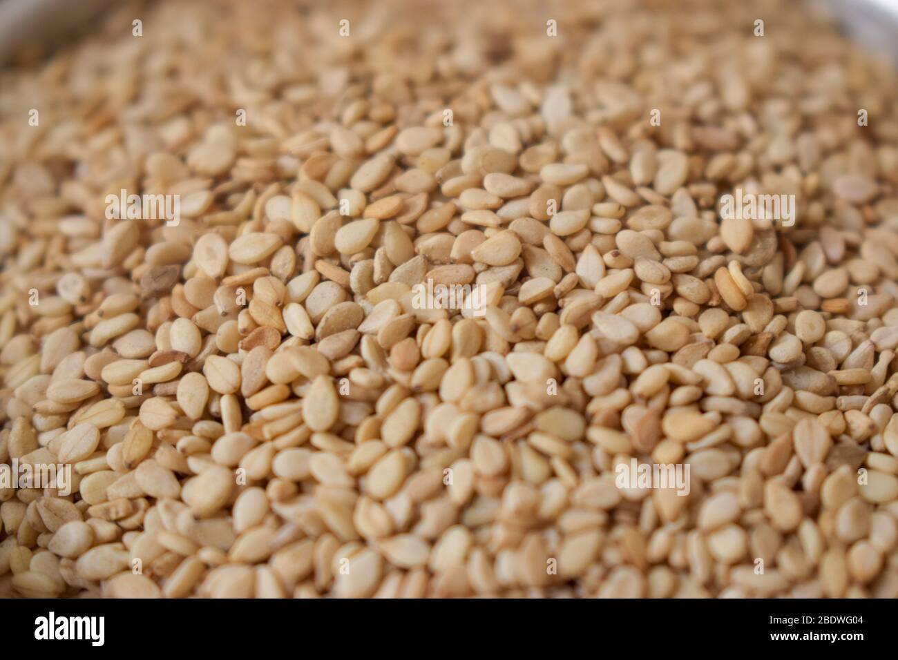 Dried Sesame Seeds as an abstract background texture Stock Photo - Alamy
