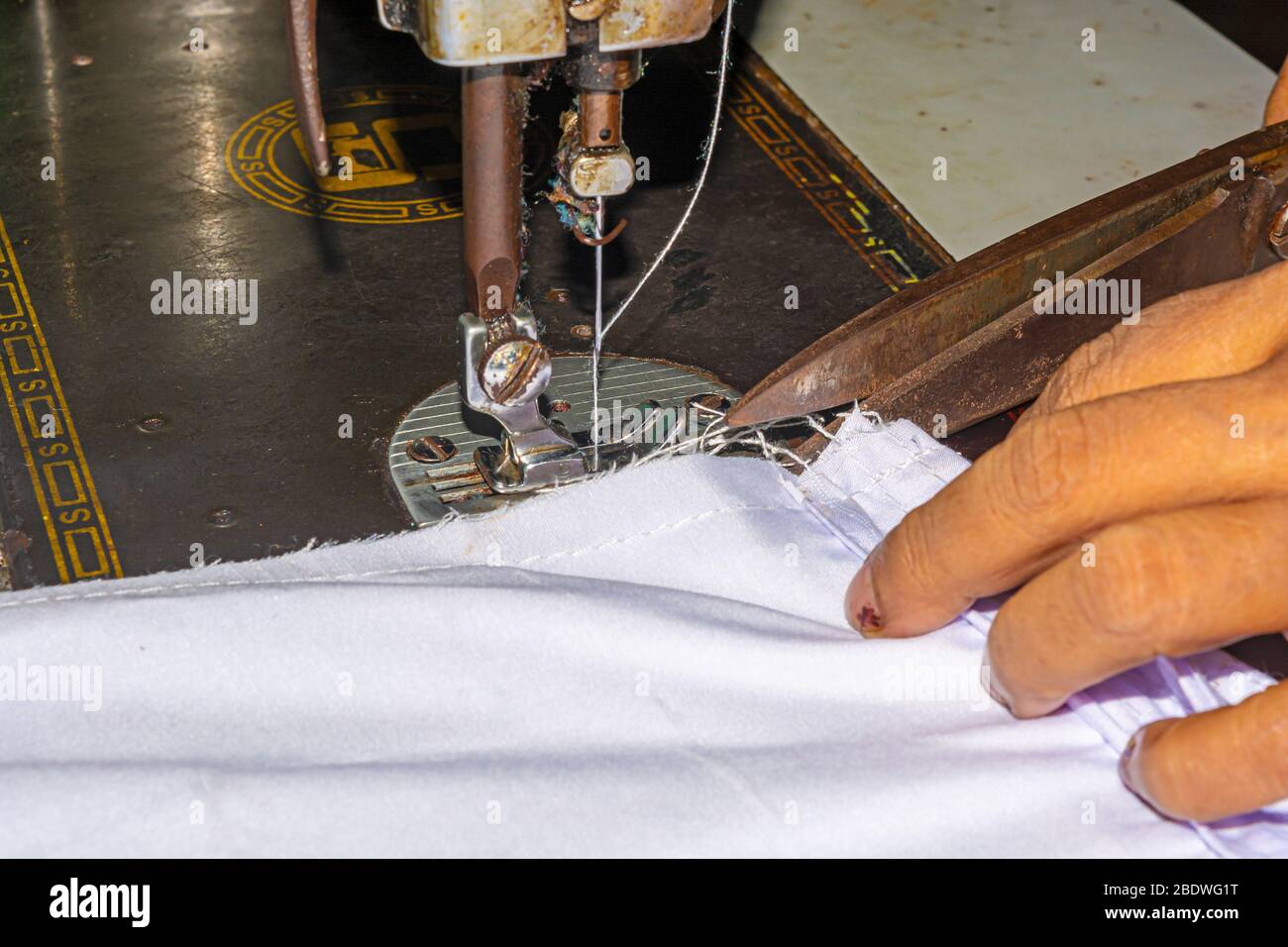 Indian Woman Sewing High Resolution Stock Photography and Images - Alamy