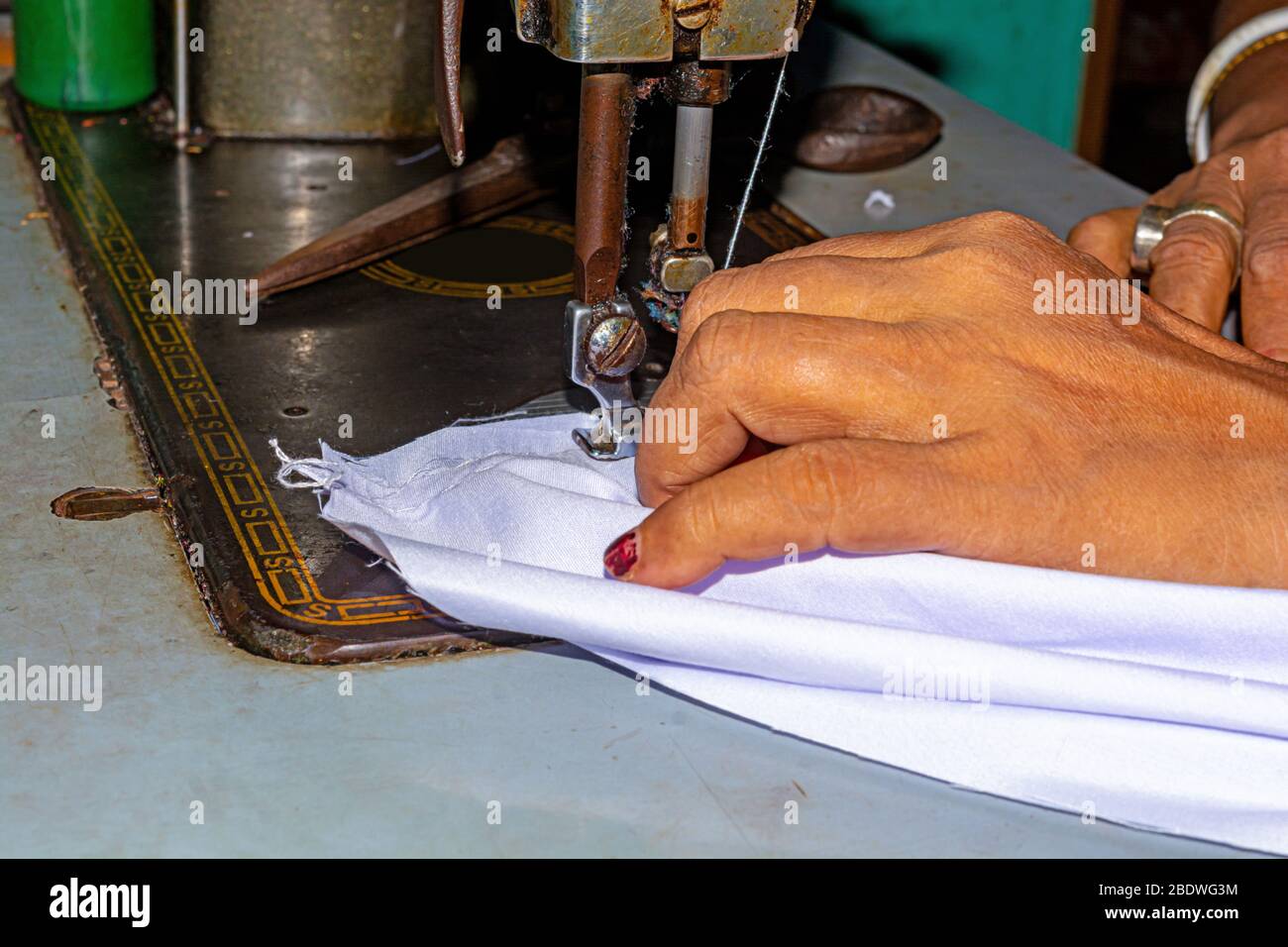 Indian Woman Sewing High Resolution Stock Photography and Images - Alamy