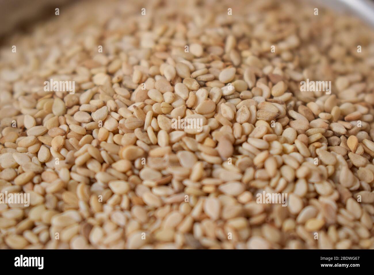 Dried Sesame Seeds as an abstract background texture Stock Photo - Alamy