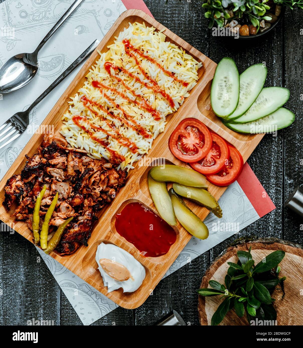 fried chicken kebab with rice and vegetables Stock Photo - Alamy
