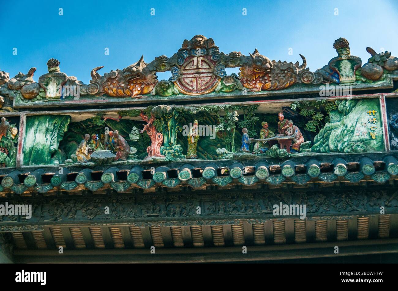 Carvings and a relief on the roof of a building at the Chen Clan ...