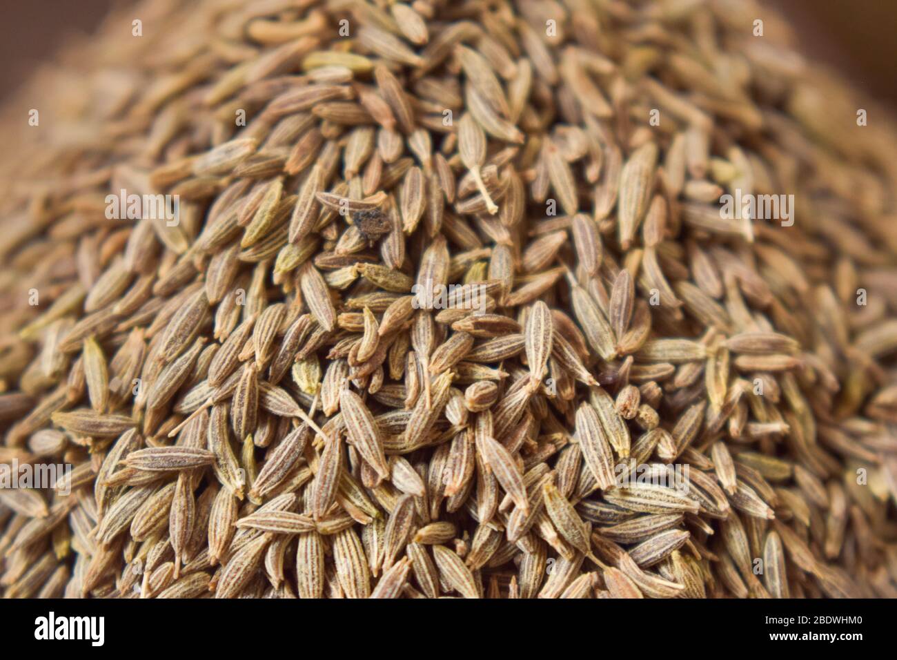 Dried Cumin Seeds as an abstract background texture Stock Photo - Alamy