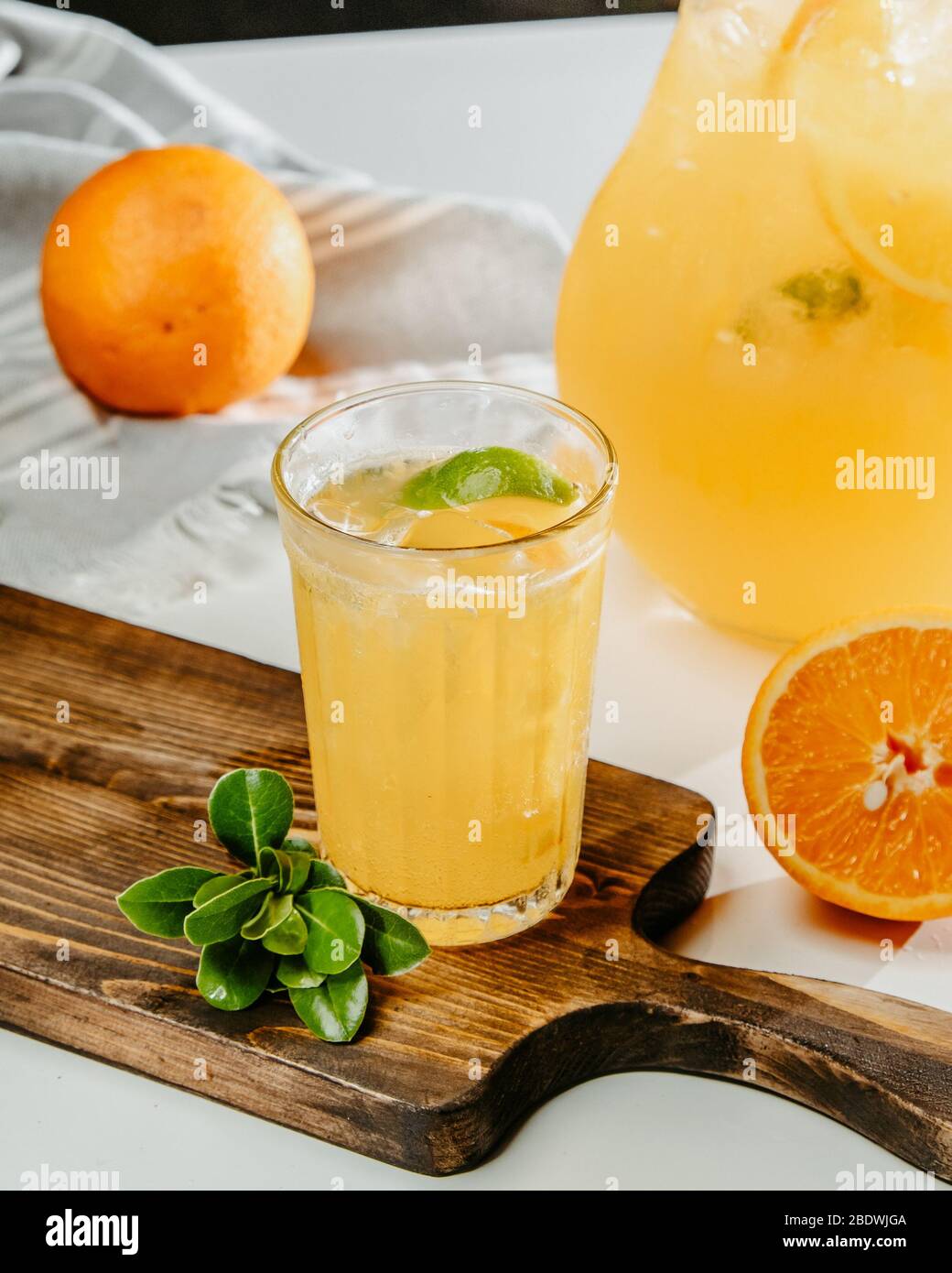 orange and lemon lemonade with ice Stock Photo - Alamy