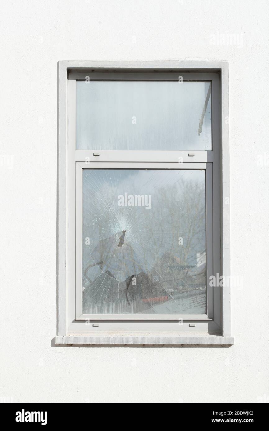 Old window with shattered glass on a demolition house Stock Photo - Alamy