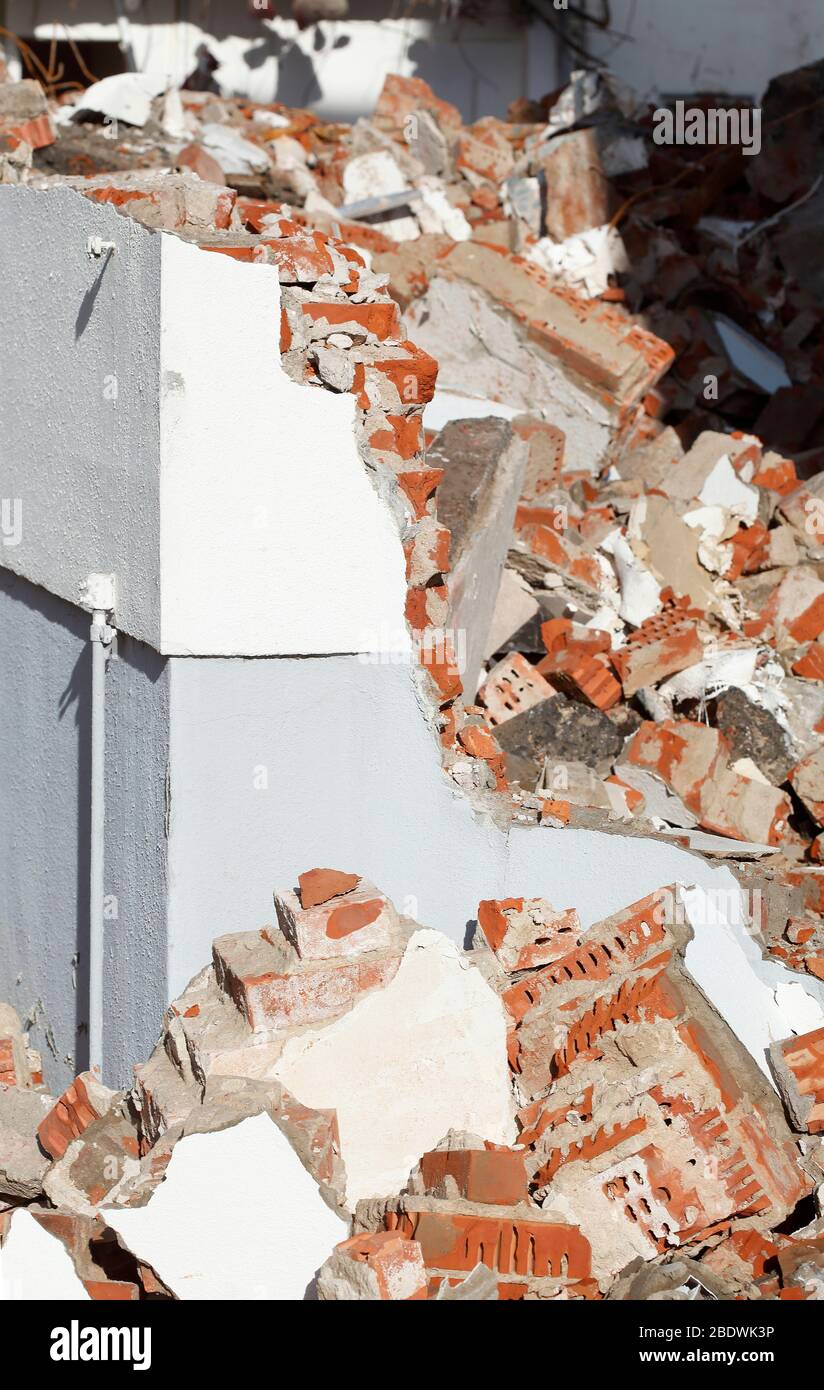 House demolition, remains of walls and debris from a demolished house ...