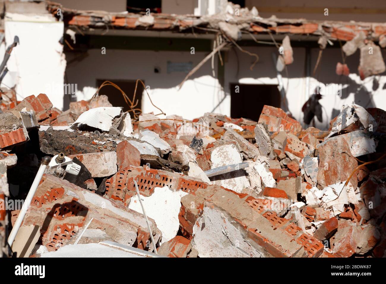 House demolition, remains of walls and debris from a demolished house ...