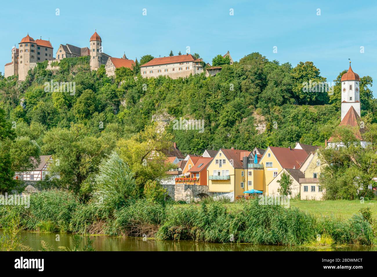 River landscape in the Wörnitz valley, with Harburg Castle in the ...