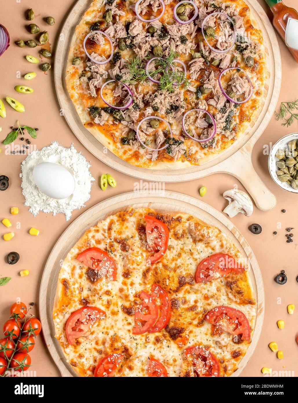 Two pizzas table hi-res stock photography and images - Alamy