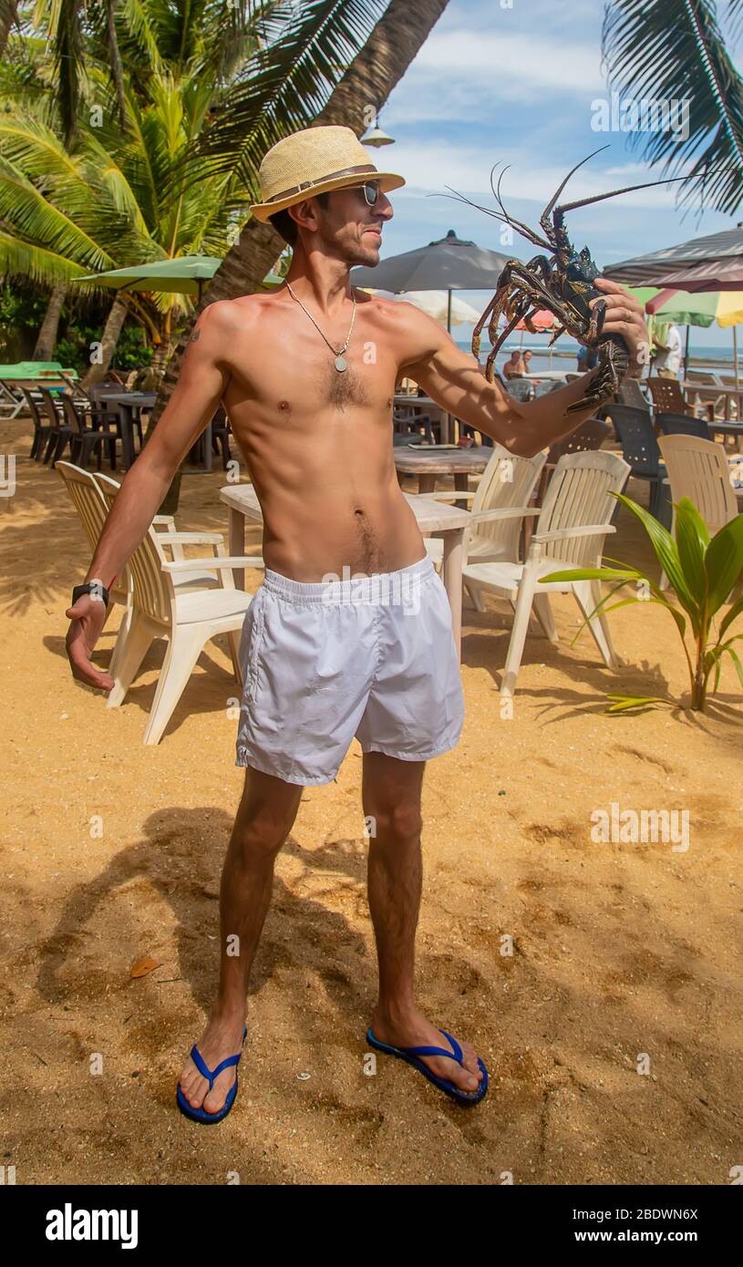 Live big lobster in the hands of people. Selective focus. nature Stock ...