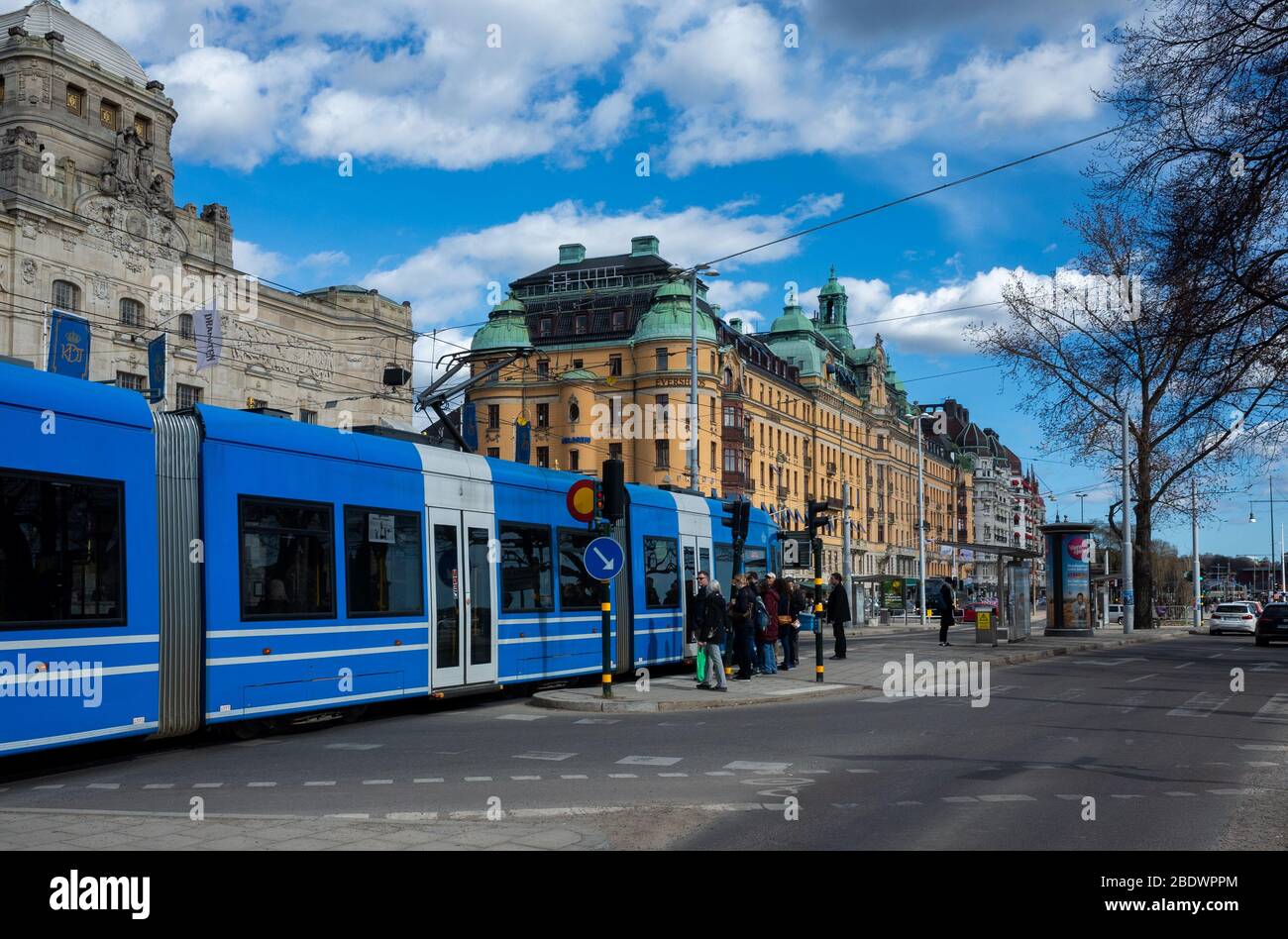 April 22, 2018, Stockholm, Sweden. Blue tram on one of the streets of ...