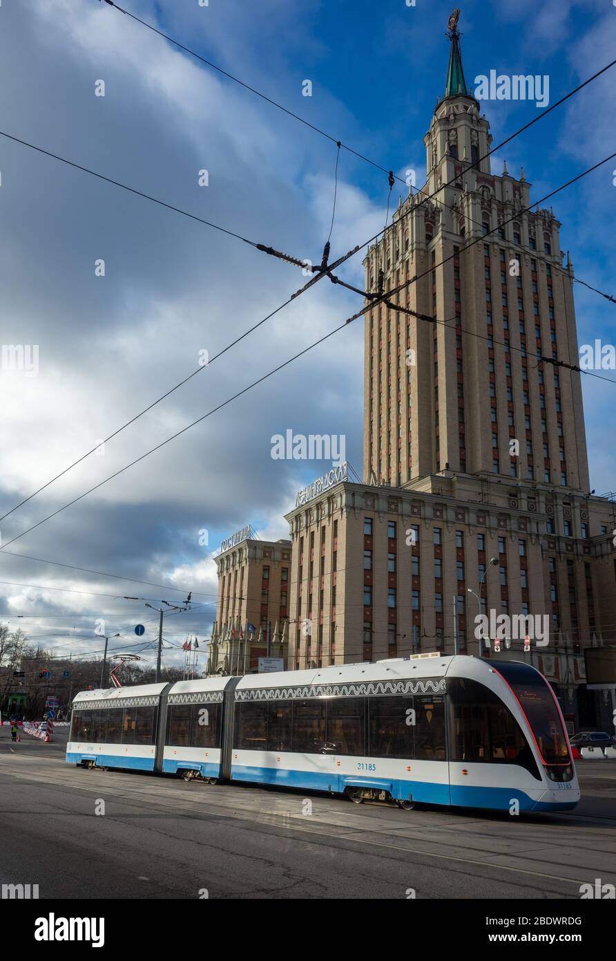 April 1, 2019 Moscow, Russia. Tram on the background of the building of ...