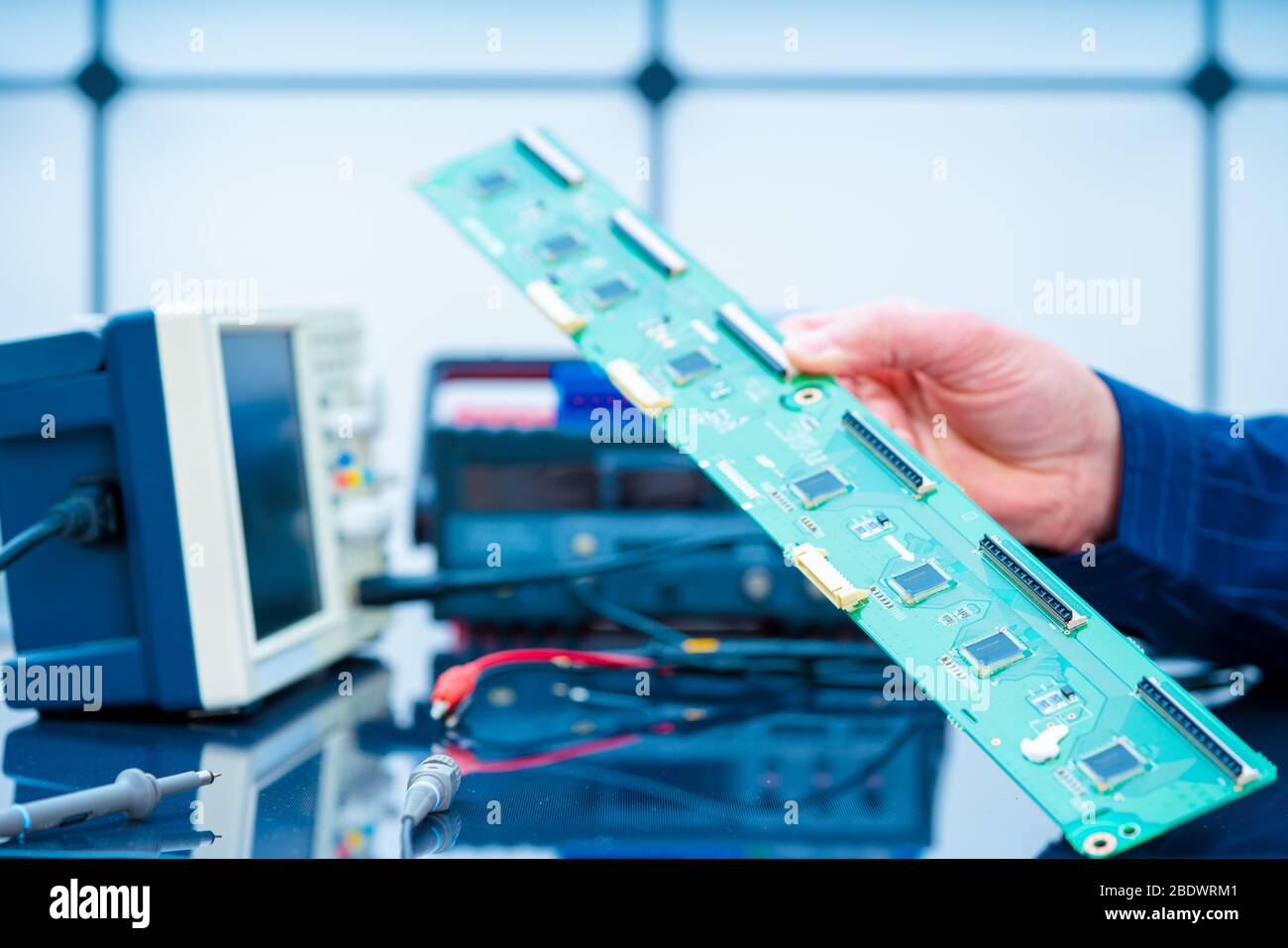 Debugging electronics device. PCB witch microcontroller in electronics laboratory Stock Photo ...