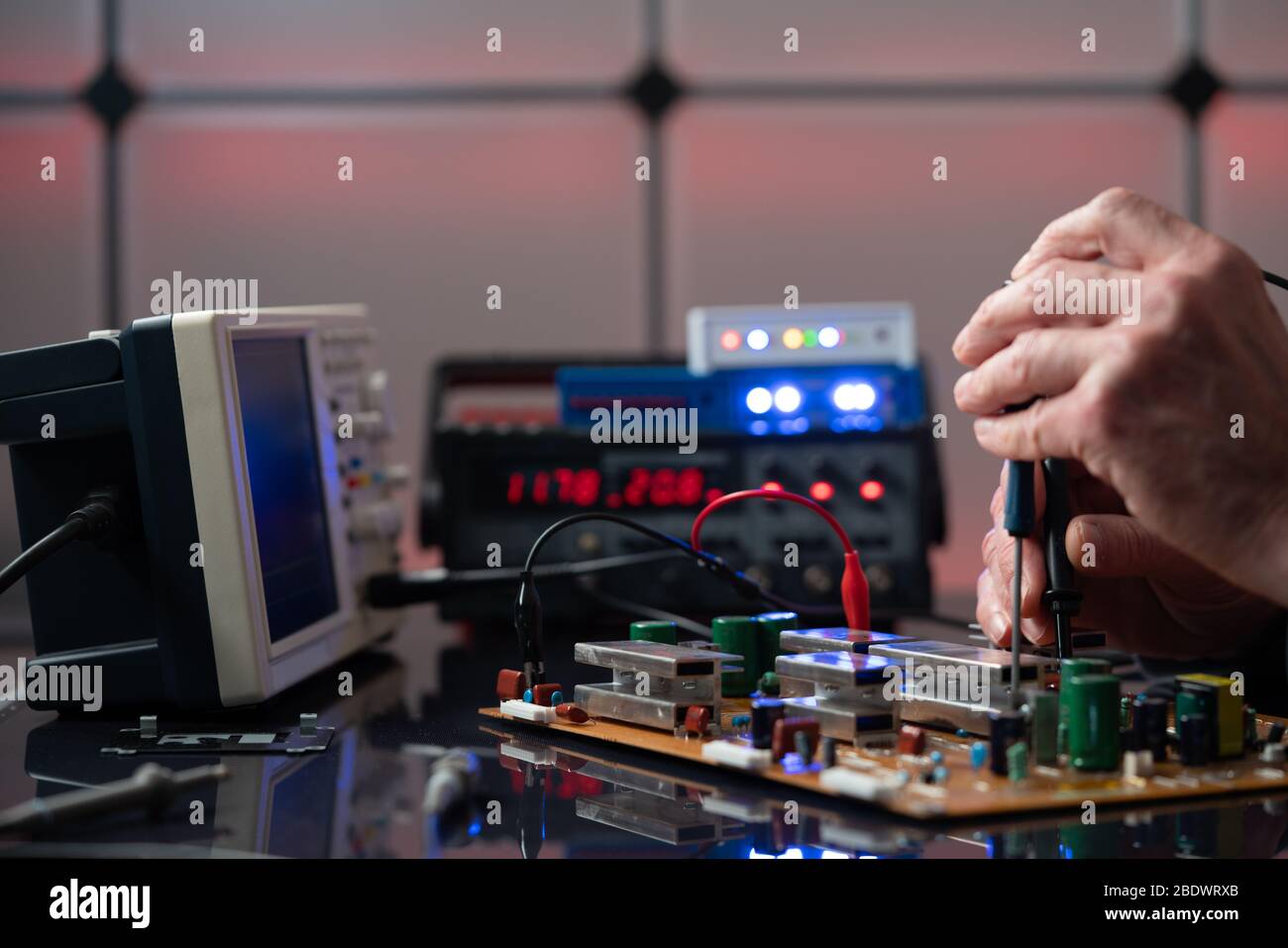 Debugging electronics device. PCB witch microcontroller in electronics ...