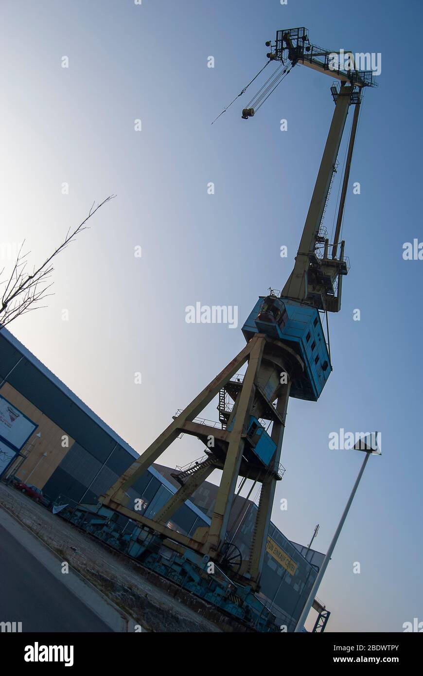 An old crane at a shipyard in Rostock, Germany Stock Photo - Alamy