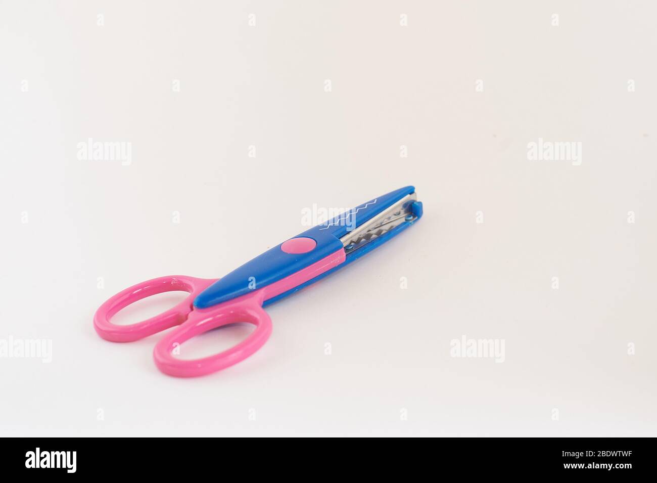 Pink and blue scissors for school crafts on white background Stock ...