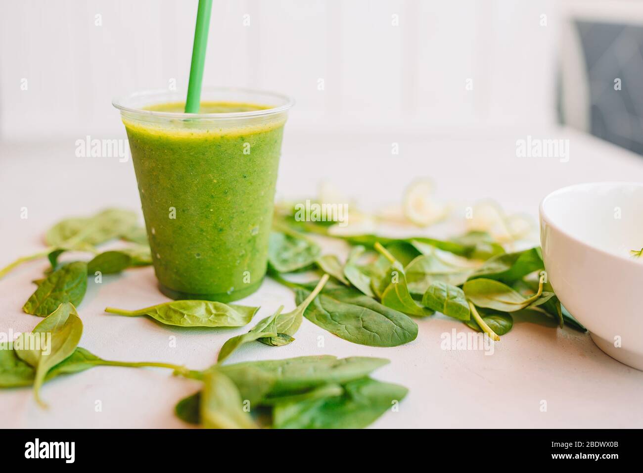 Row of healthy fresh fruit and vegetable smoothies with assorted ...