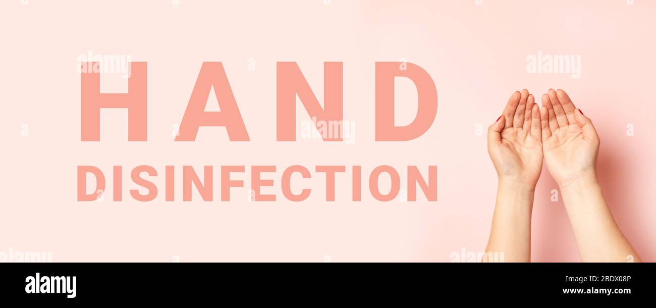 Hand sanitization. Human hands with palms up on pink background Stock ...