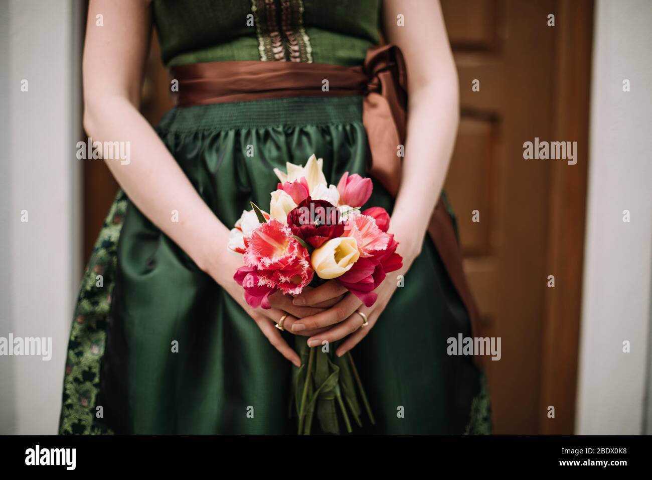 Flower bouquet of colorful tulips and traditional bavarian wedding ...