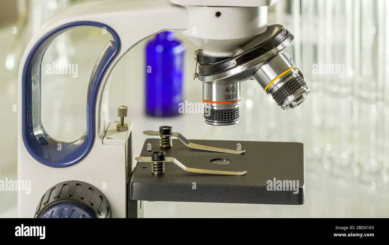 A closer look of the microscope on the table inside the laboratory ...