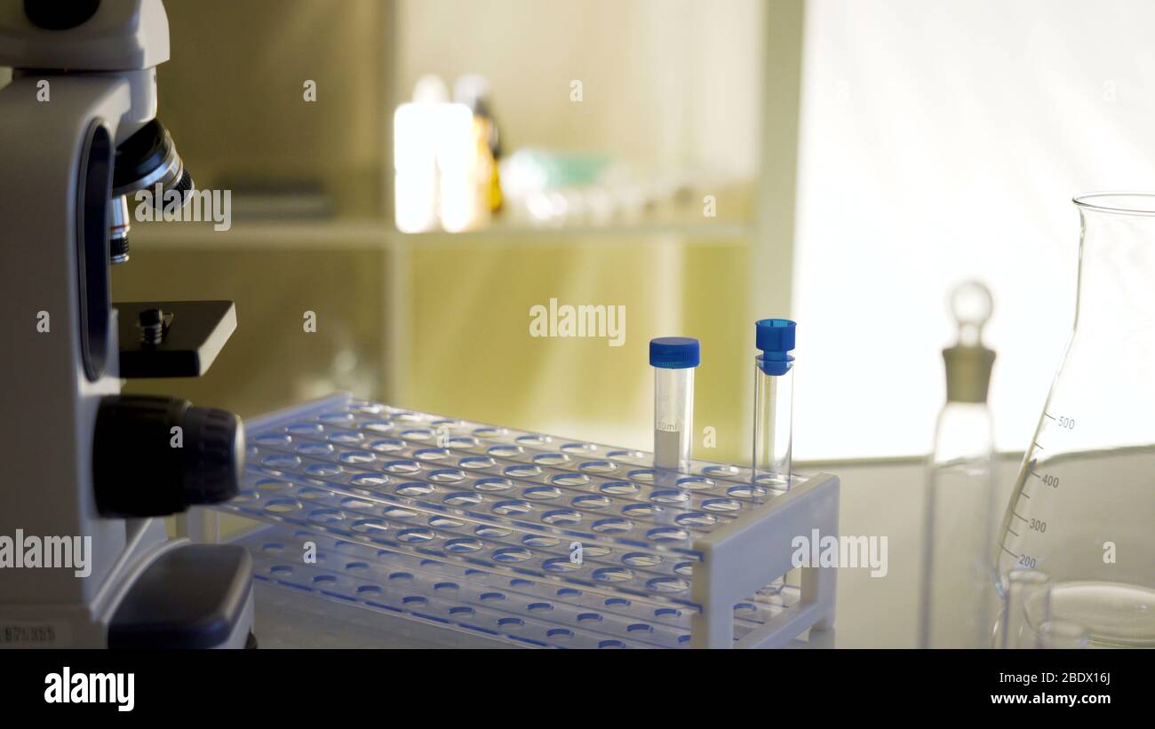 View of the laboratory equipments on the table with the test tubes ...