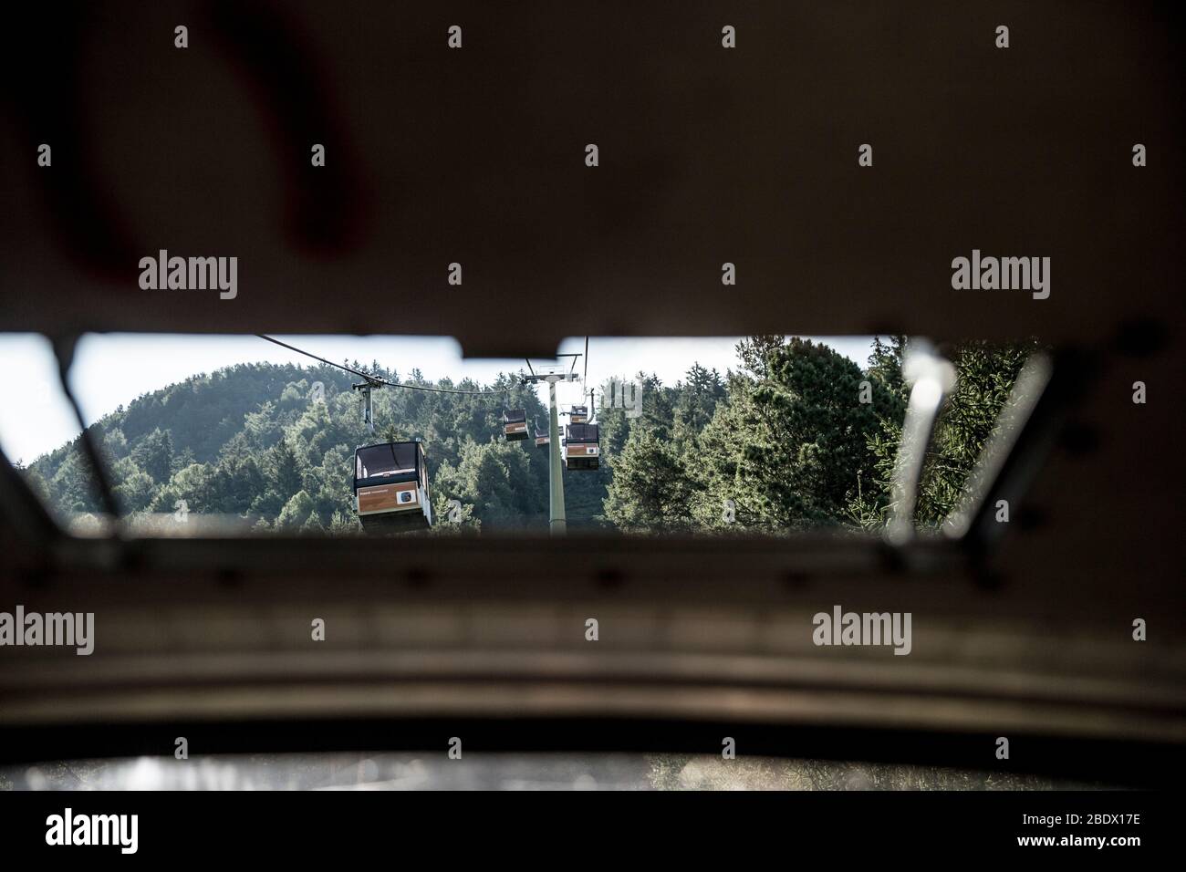 Cable cars on the line leading to the ski resort of Plose seen through ...