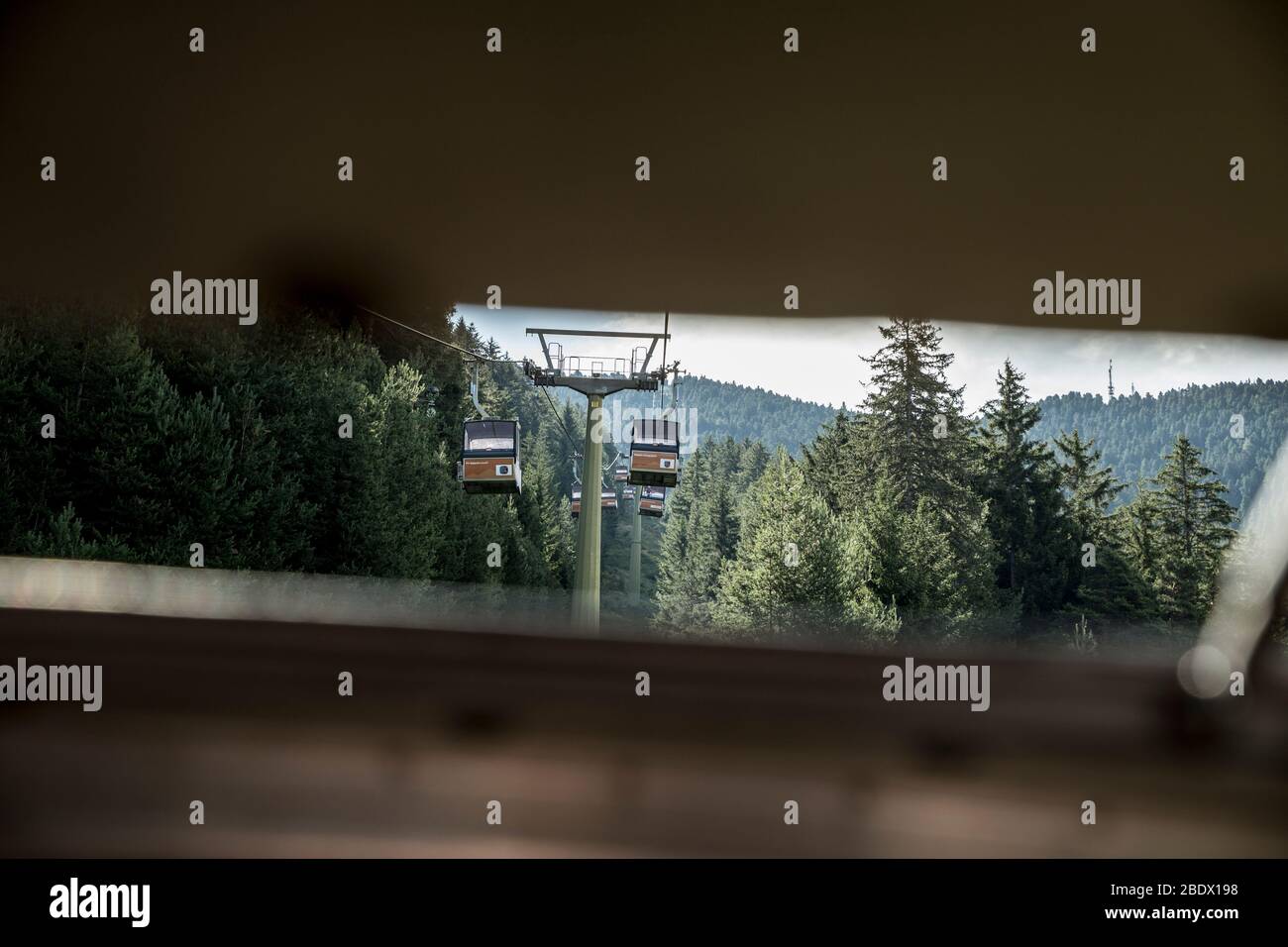 Cable cars on the line leading to the ski resort of Plose seen through ...