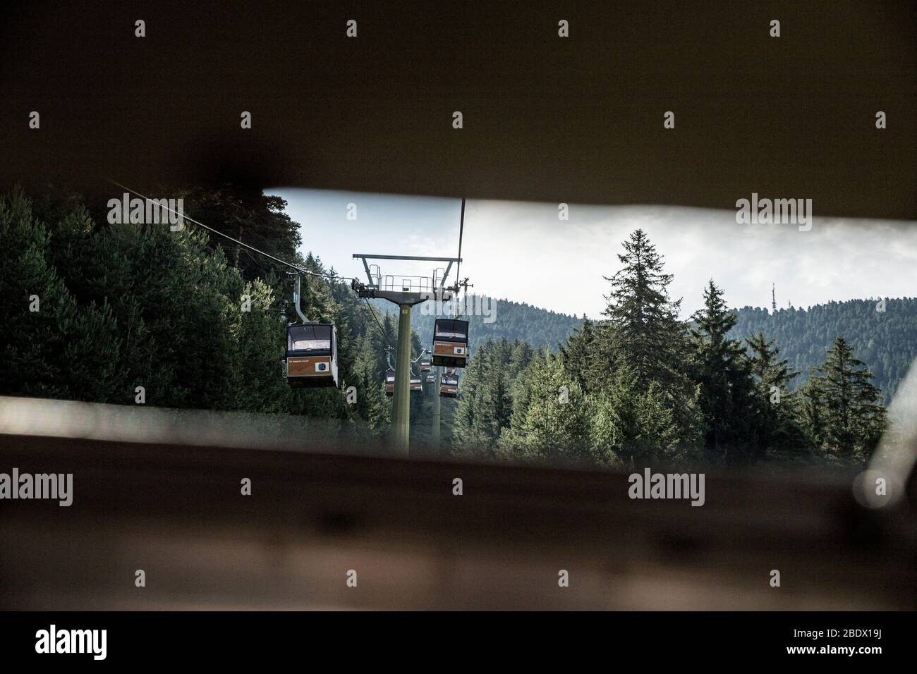 Cable cars on the line leading to the ski resort of Plose seen through ...