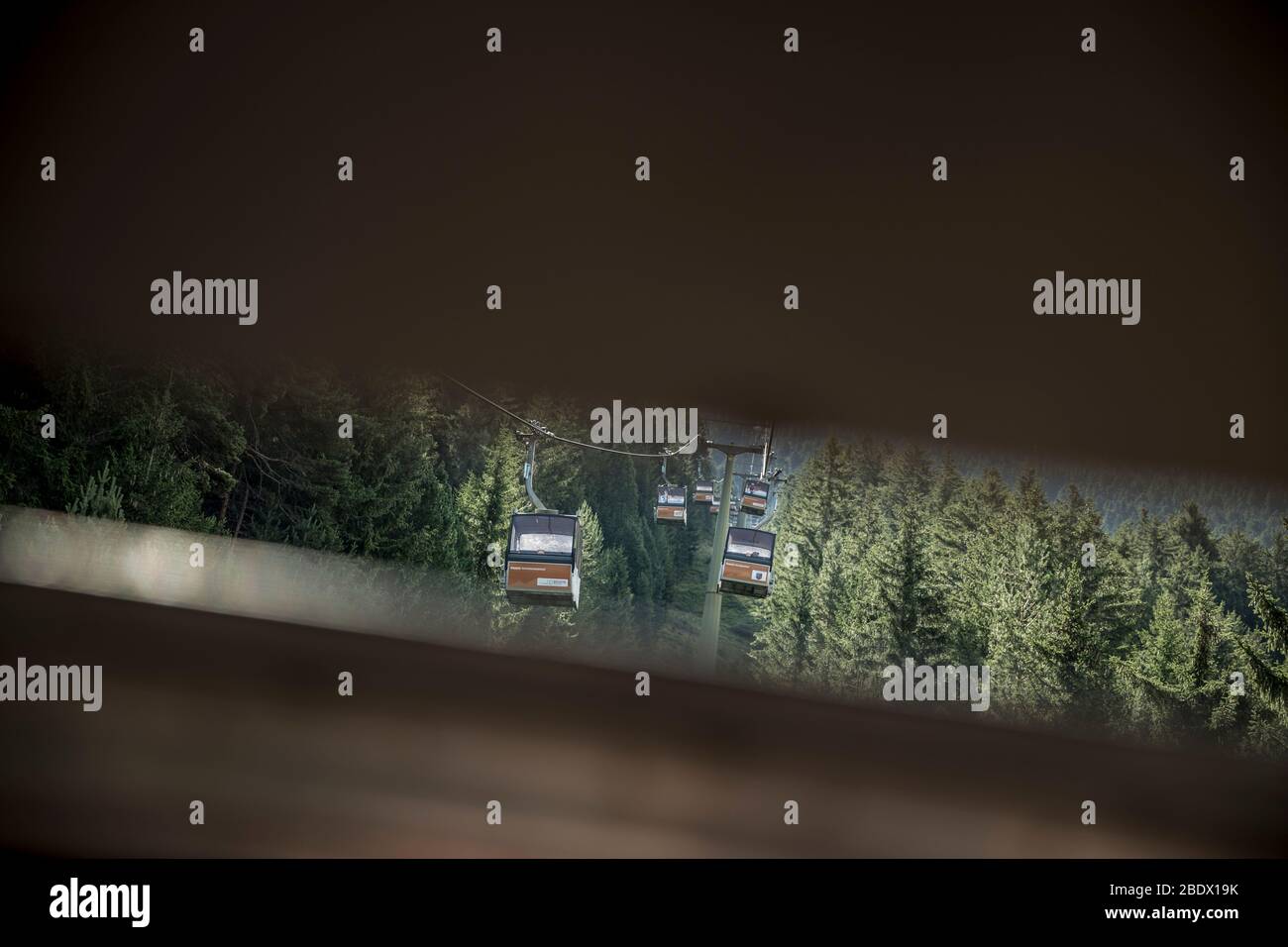 Cable cars on the line leading to the ski resort of Plose seen through ...