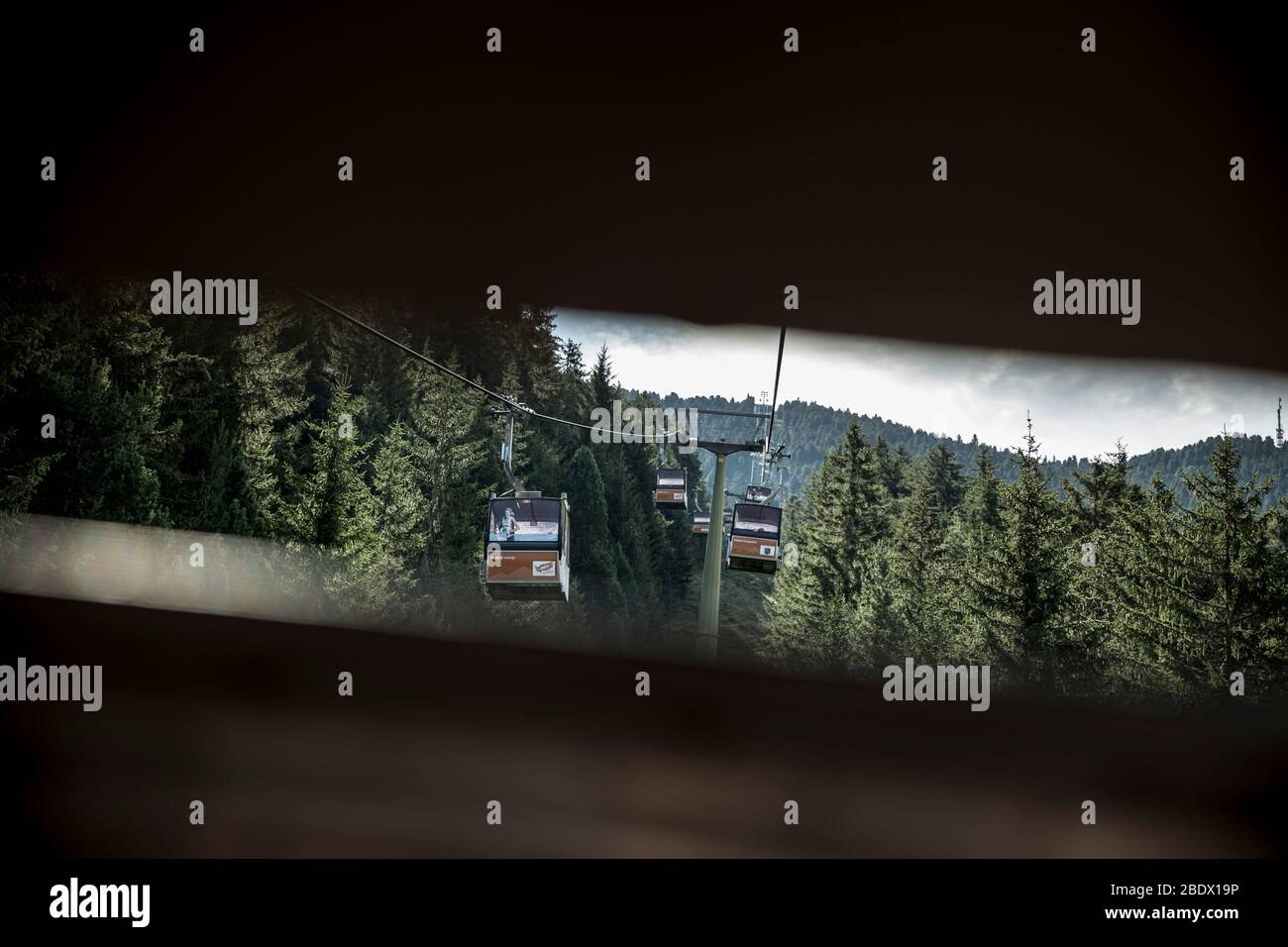 Cable cars on the line leading to the ski resort of Plose seen through ...