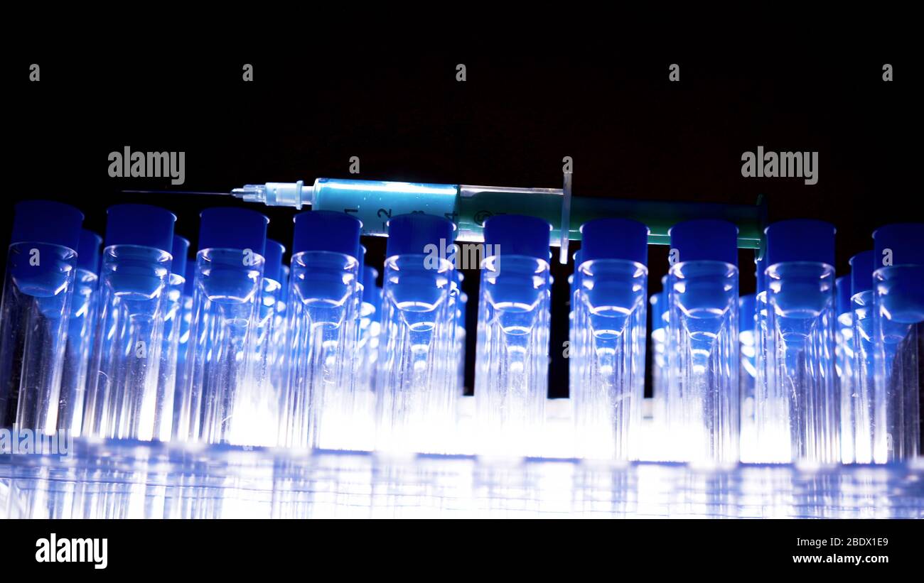 Test tubes blue liquid inside hi-res stock photography and images - Alamy