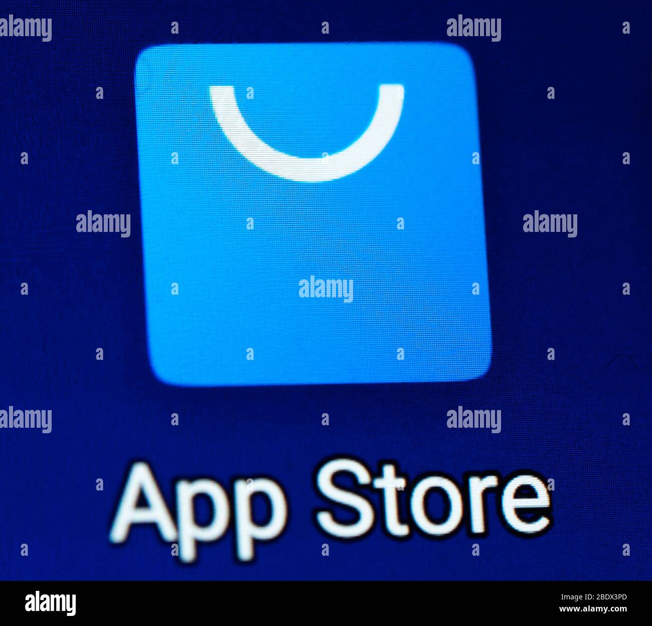 In this photo illustration a App Store icon is seen displayed on a ...