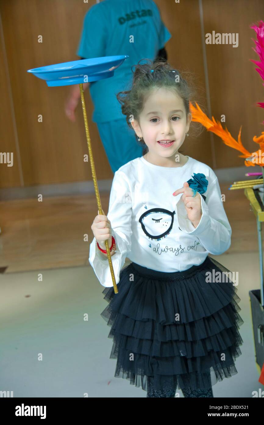 Child spinning plates hi-res stock photography and images - Alamy