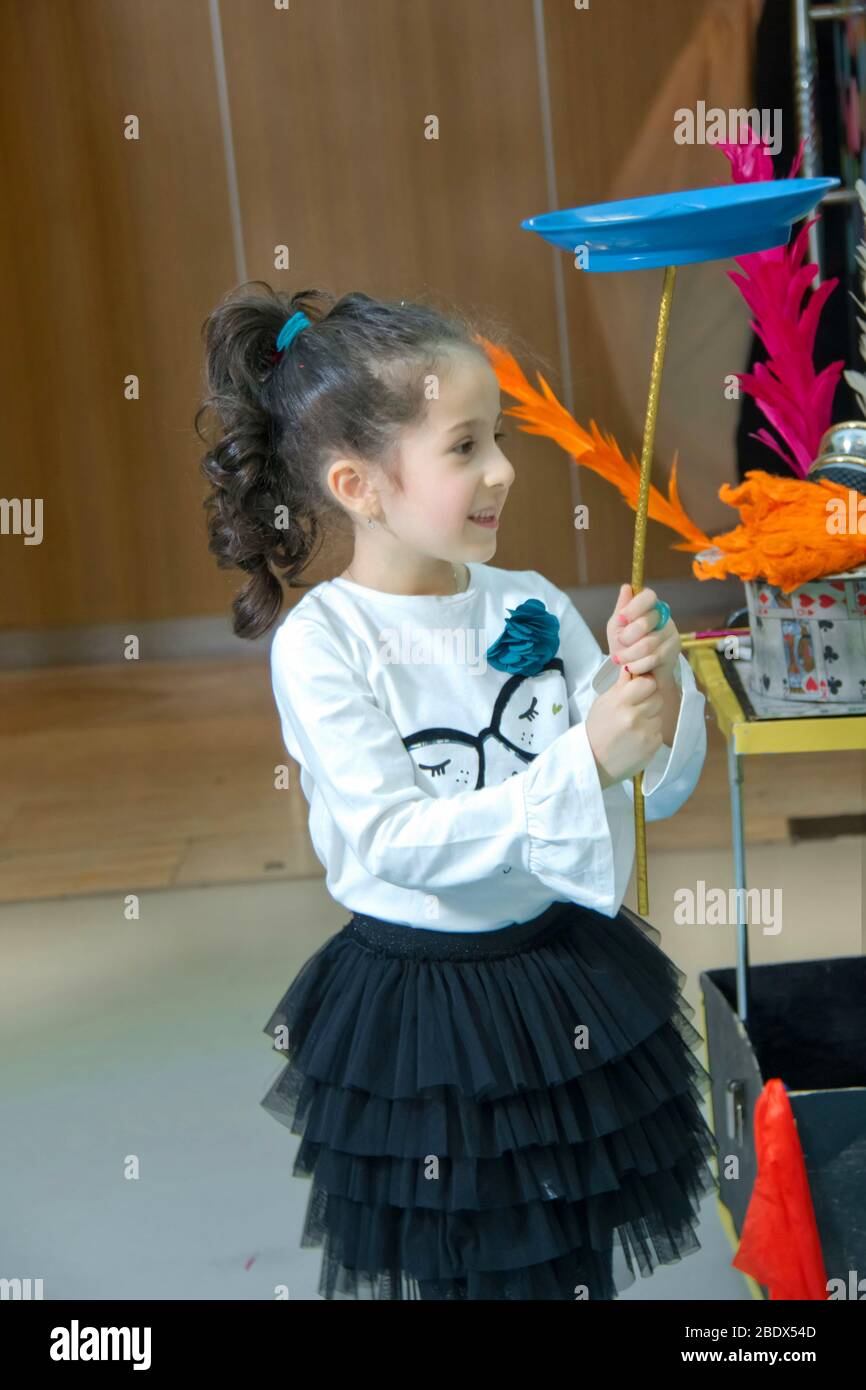 Child spinning plates hi-res stock photography and images - Alamy