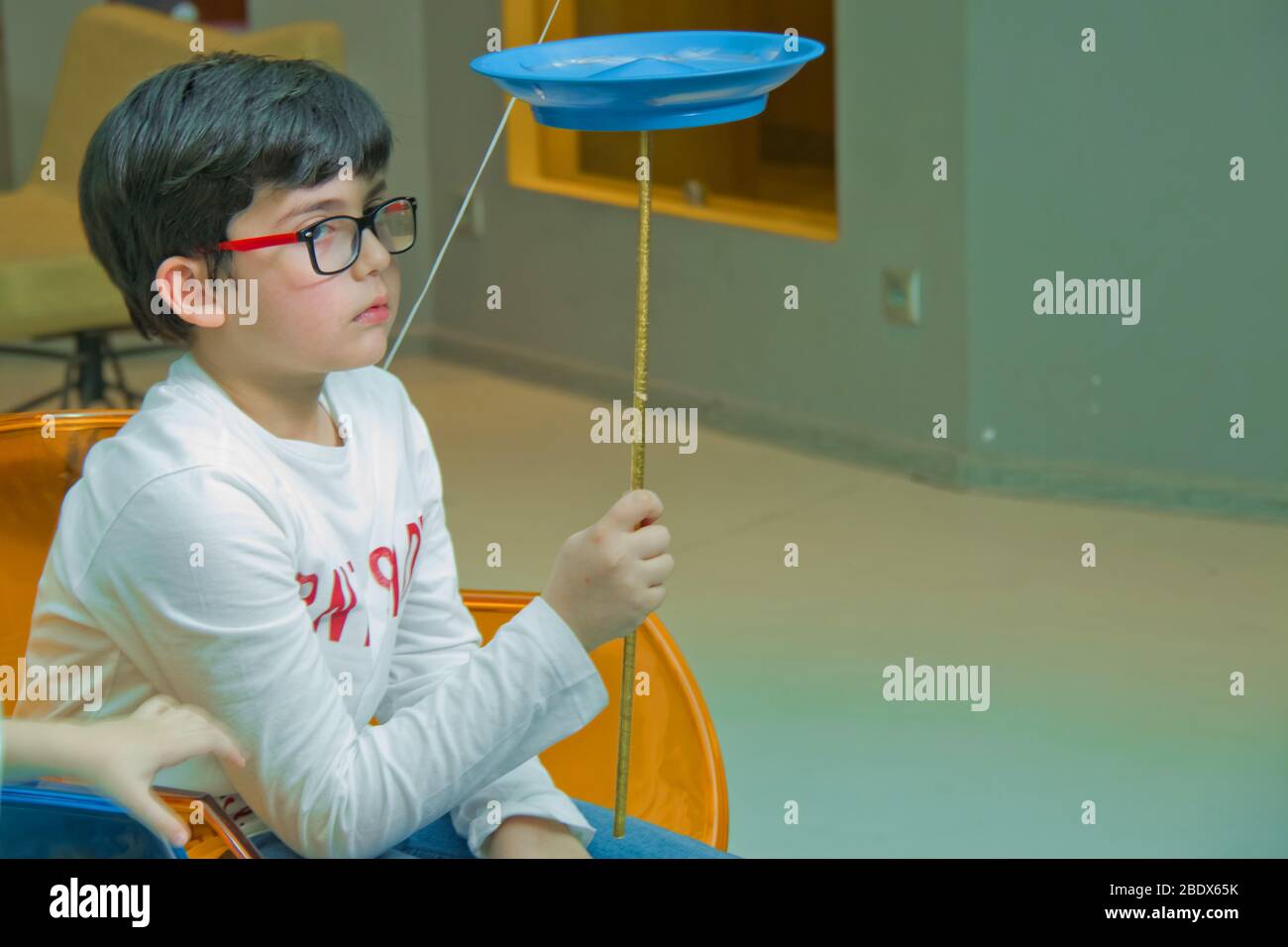 Fun with Spinning Plates .balancing a spinning plate. Kids learning how ...