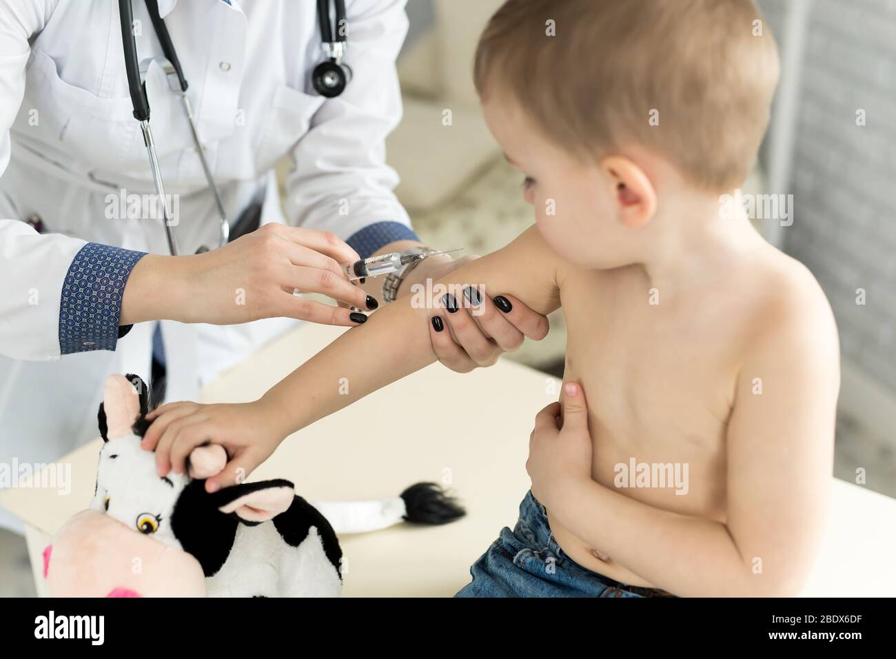 Doctor Giving Child Intramuscular Injection High Resolution Stock ...