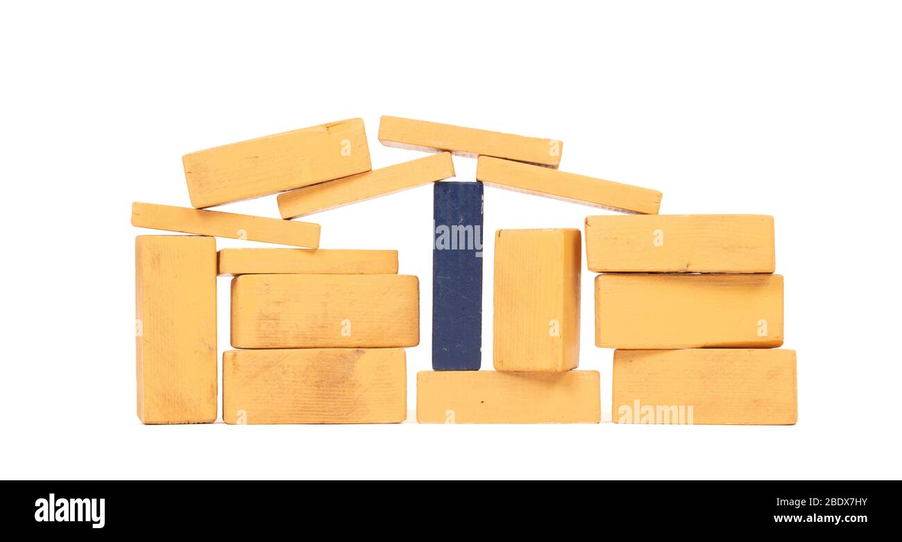 Vintage orange building blocks isolated on white background, one blue ...
