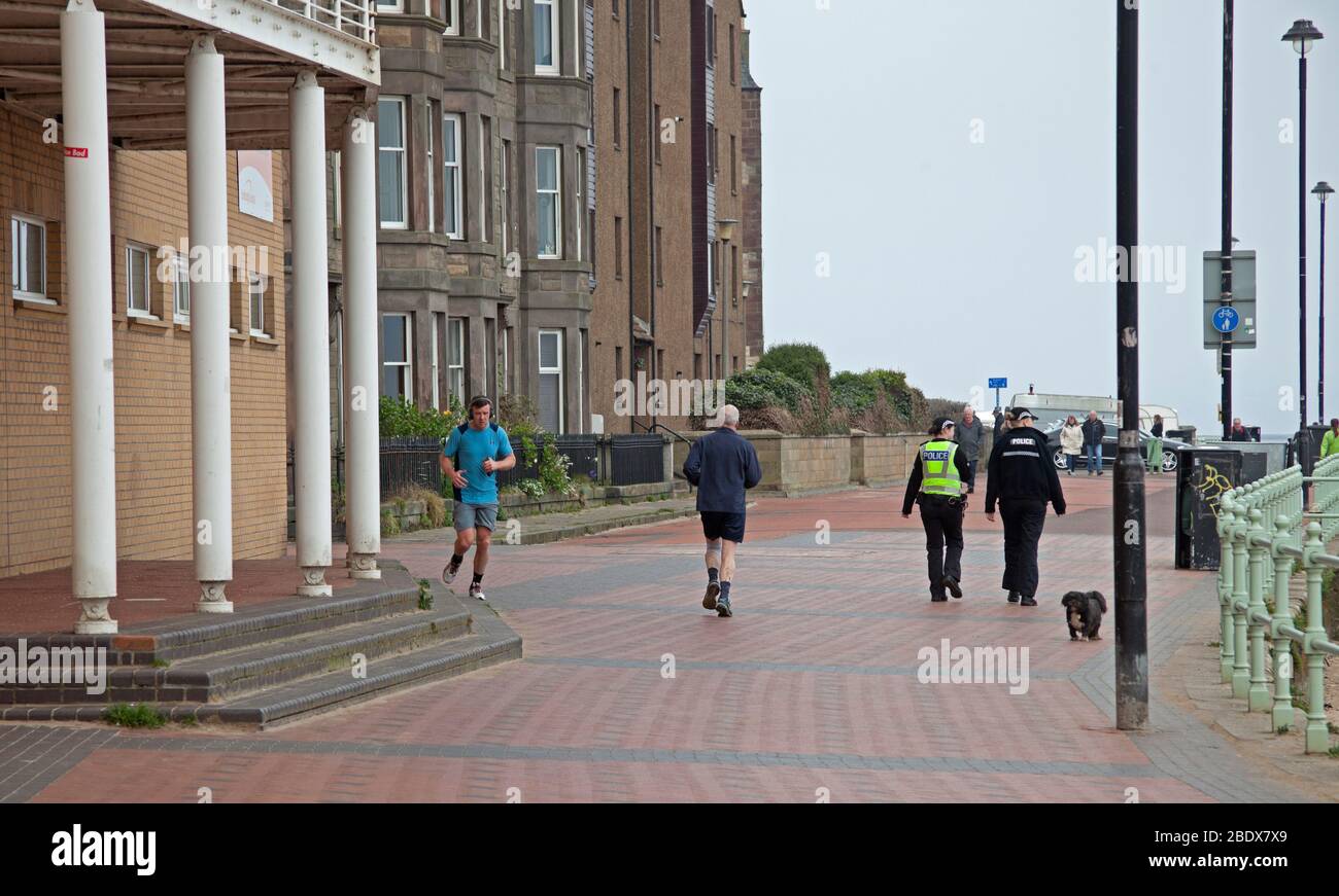 Police patrols on a very quiet Portobello beach and Promenade ...