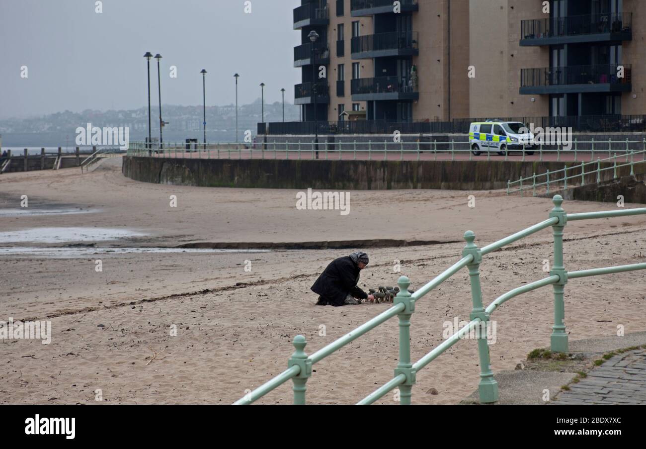 Police patrols on a very quiet Portobello beach and Promenade ...