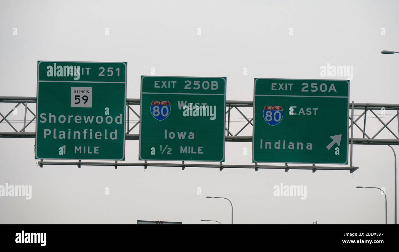 Traffic signs to Iowa and Indiana on freeway - CHICAGO, UNITED STATES ...