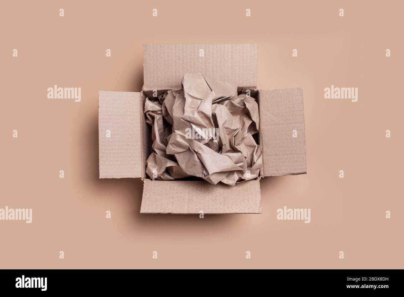 Full box of wrinkled paper. Excess packaging concept. Copy space Stock ...
