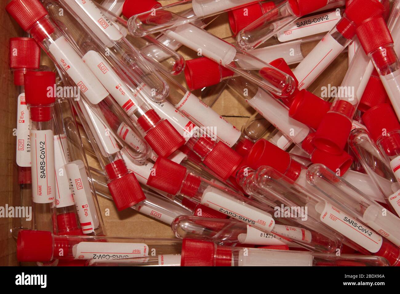Test tubes with a corona virus label, closeup background. SARS-CoV-2 ...