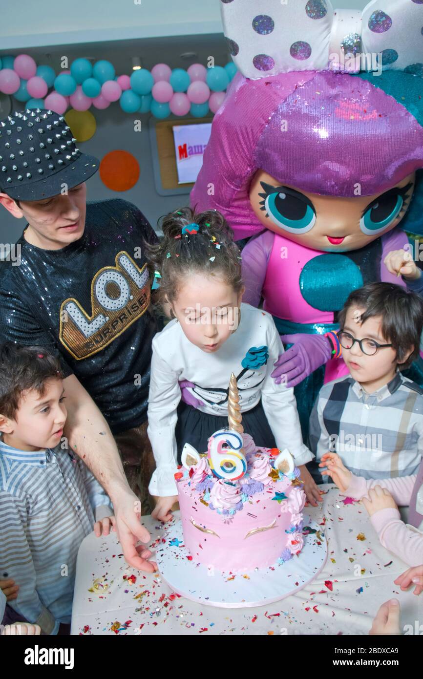Children's birthday party with Lol animators. Happy group of children ...