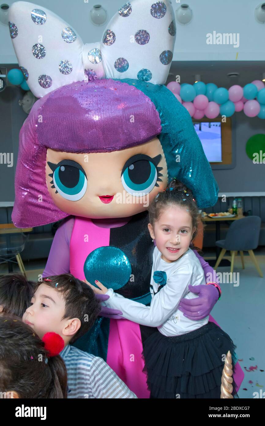 Children's birthday party with Lol animators. Happy group of children ...