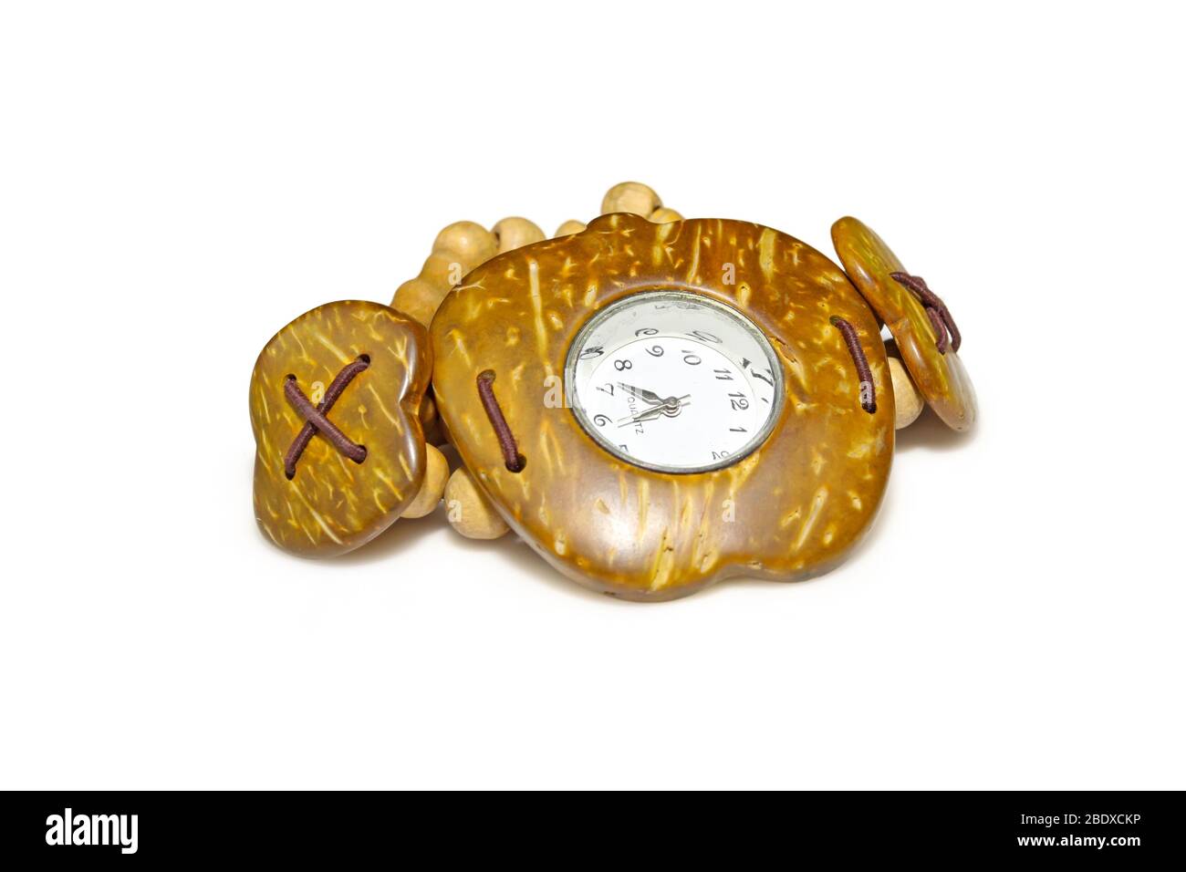 closeup of coconut shell watch on a white background Stock Photo - Alamy
