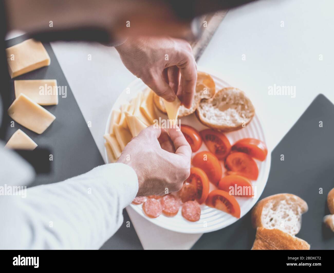 Male hands preparing sandwiches hi-res stock photography and images - Alamy